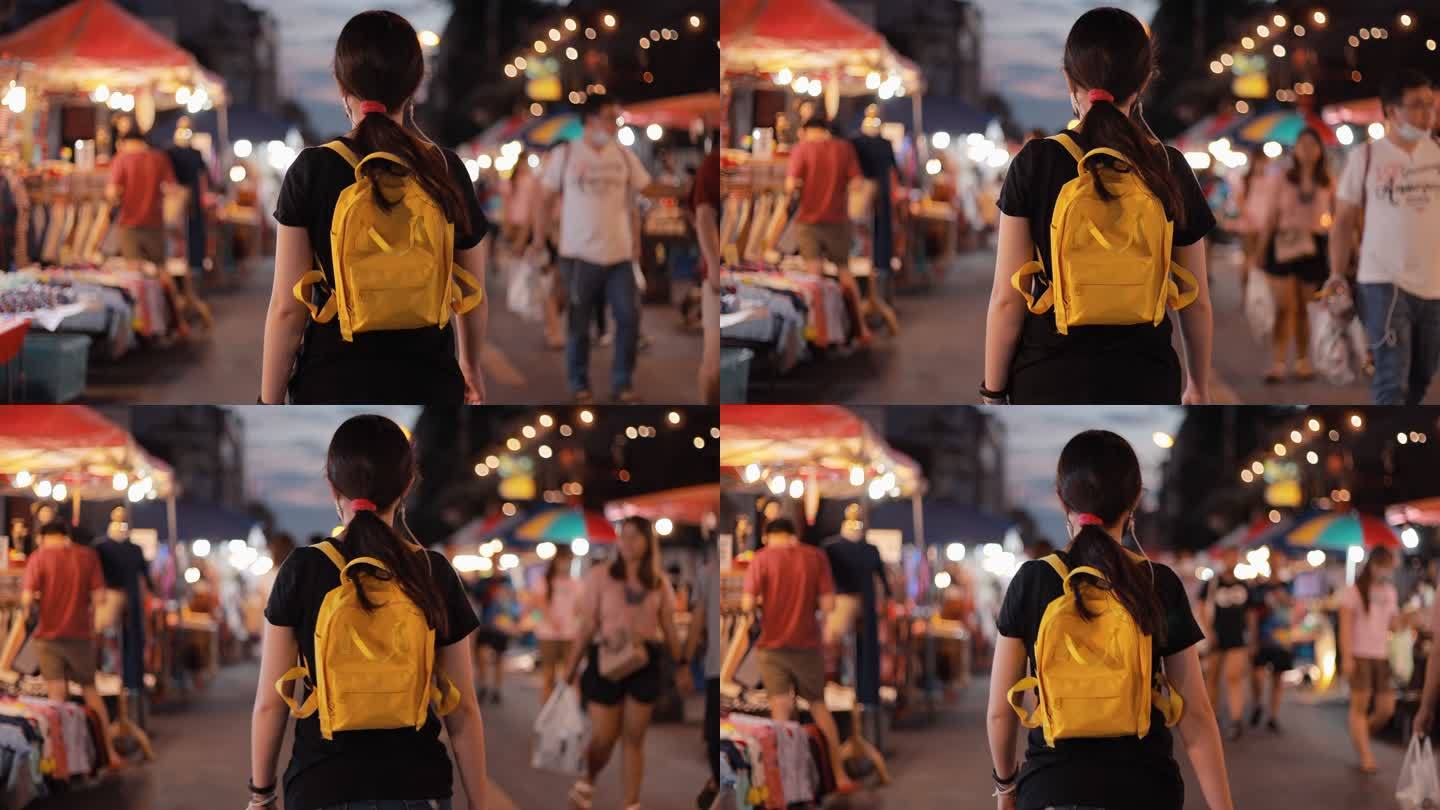 SLO_MO泰国清迈当地夜市街头美食上的少女_视频素材下载